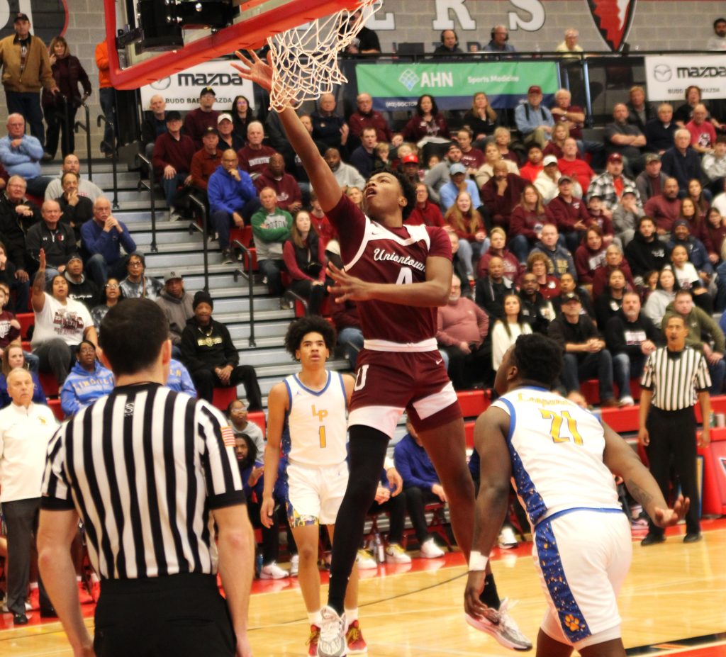 Battle to the finish: Lincoln Park fends off Red Raiders in 74-63 win ...